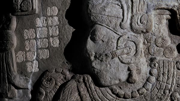 Carved glyphs and face - Calakmul Stela 51